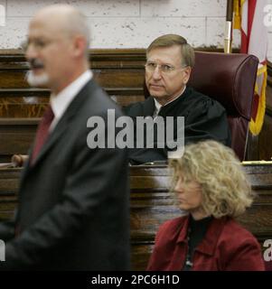 Huron County Judge Earl McGimpsey questions defense attorneys during a ...