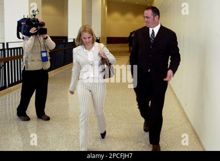 Kim Wickman, wife of Philadelphia Phillies pitcher Brett Myers, right ...