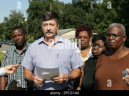 Melba Rainey Thompson, sister of Detra Rainey Simmons, holds a ...