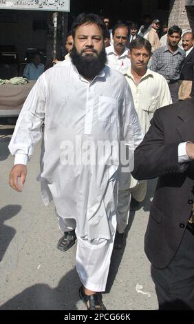 Sajad Ahmed Rana, center, father of Scottish girl Molly Campbell, also ...