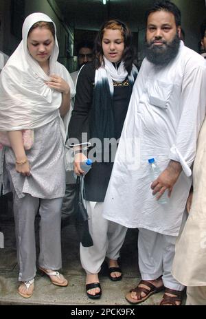 Sajad Ahmed Rana, left, father of Scottish girl Molly Campbell, also ...