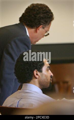 Defendant Esteban Carpio sits in court next to his attorney, Robert L ...