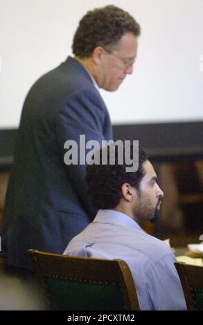 Defendant Esteban Carpio sits in court next to his attorney, Robert L ...