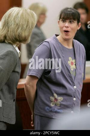Andrea Yates, left, appears in court with Mary Parnham, right, wife of ...