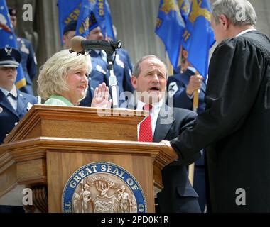 Idaho Gov. Jim Risch, with his wife Vicki, cut Idaho's 116th birthday ...