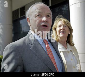 Enron founder Ken Lay, left, and his wife Linda return to the federal ...