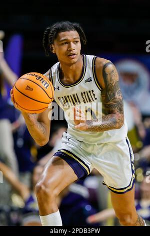 Montana State guard RaeQuan Battle (21 puts up a shot over Northern ...