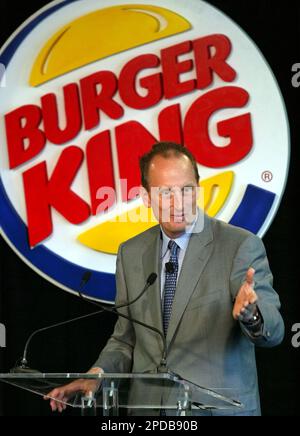 Greg Brenneman, chairman and CEO of the Burger King Corp. makes a ...