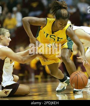 Minnesota guard Shannon Schonrock, right, strips the ball from St. Francis, Pa., guard Amber ...