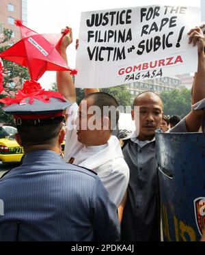 Filipino priest Father Robert Reyes gestures during a press conference ...