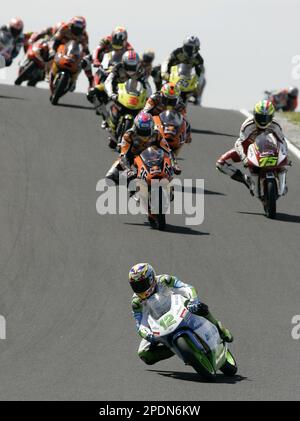 125cc rider Thomas Luthi leads from Switzerland leads a pack of riders ...
