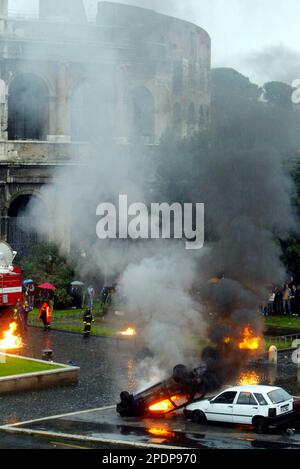 Cars burn during a simulated suicide bombing terrorist attack in front ...
