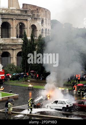 Cars burn during a simulated suicide bombing terrorist attack in front ...