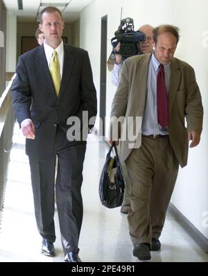 Franklin County Circuit Judge William Graham, left, talks with ...