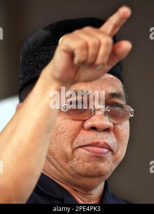 Moro Islamic Liberation Front chairman Al Haj Murad gestures as he ...