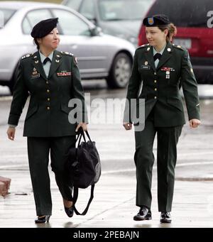 Spc. Sabrina D. Harman, right, and her attorney Capt. Patsy Takemura ...