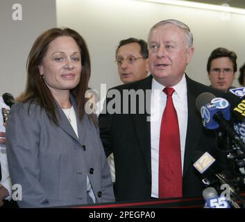 Suffolk County Assistant District Attorney Janet Albertson, center ...