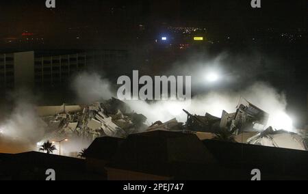 The remaining towers of the Desert Inn Hotel are seen moments before ...