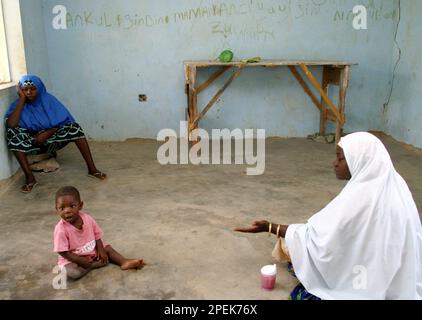 Eighteen year-old Hajara Ibrahim waits at the court waiting room while ...