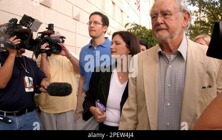 Lea Fastow, center is walked by her brother Michael and father Jack ...