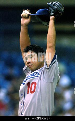 Dodgers Pitcher Hideo Nomo adjusts his cap in his MLB debut in San ...