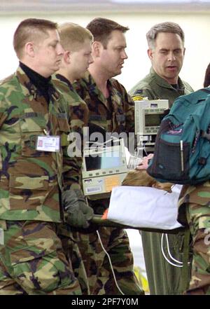 U.S. Army Pfc. Jessica Lynch is carried on a stretcher to be loaded ...