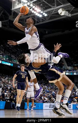 Montana State guard RaeQuan Battle (21 puts up a shot over Northern ...