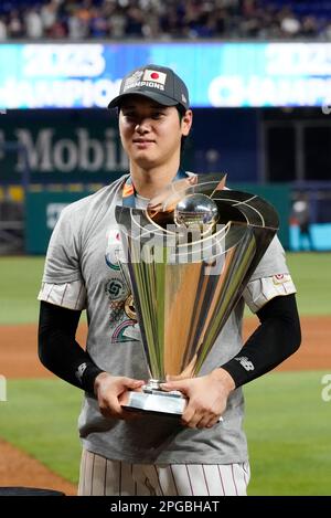 Japan's Shohei Ohtani receives a trophy after winning the World ...