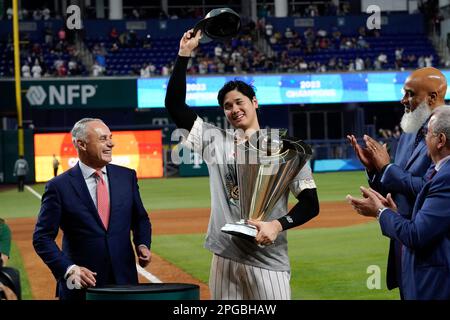 Japan's Shohei Ohtani receives a trophy after winning the World ...