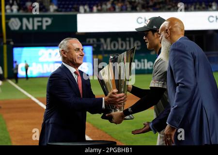 Japan's Shohei Ohtani receives a trophy after winning the World ...