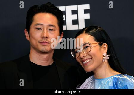 Steven Yeun, left, and Ali Wong, cast members in "Beef," pose together at the premiere of the ...