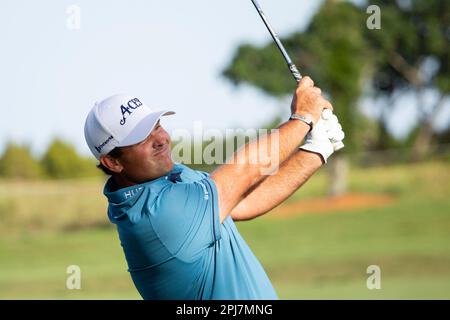 Patrick Reed of 4Aces GC hits his shot from a bunker on the 18th hole ...
