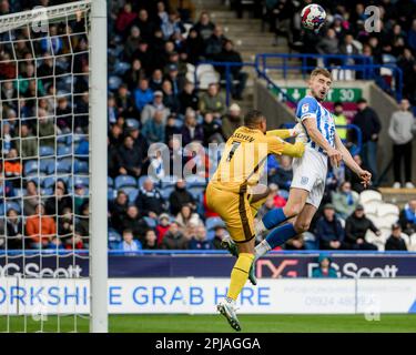 Zack Steffen #1 of Middlesbrough Fouls Michal Helik #39 of Huddersfield ...