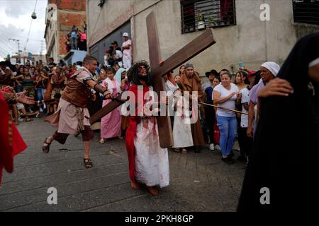 A penitent depicting the role of Jesus Christ is whipped by a fellow ...