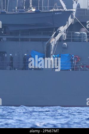 Crew members of the Chihaya, a submarine rescue ship of the Japan ...