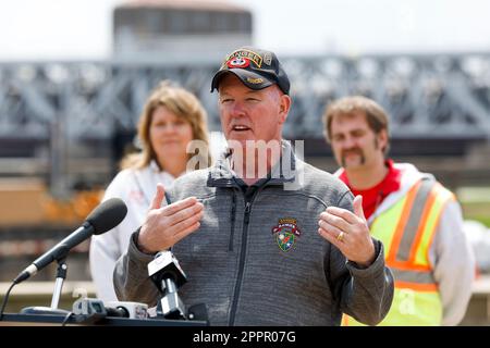 Davenport, Iowa, Mayor Mike Matson, center, listens to public comment ...