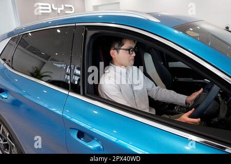 Ohta, who just bought a brand new BYD ATTO 3 electric sports utility ...