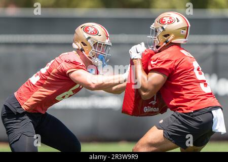 San Francisco 49ers' Brayden Willis, left, and Cameron Latu take part ...