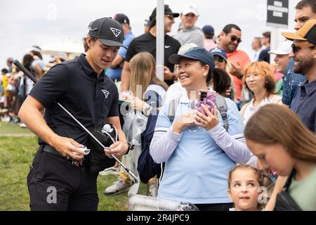 James Piot of HyFlyers GC signs autographs for fans during the final ...