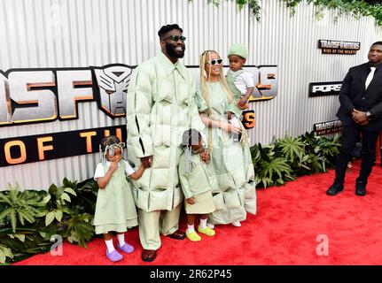 Tobe Nwigwe, center, his wife Martica Fat Nwigwe and children attend ...