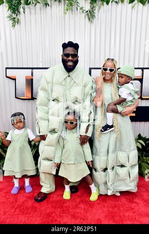 Tobe Nwigwe, center, his wife Martica Fat Nwigwe and children attend ...
