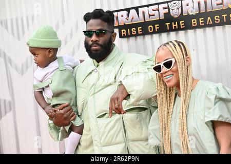 Tobe Nwigwe, center, his wife Martica Fat Nwigwe and children attend ...