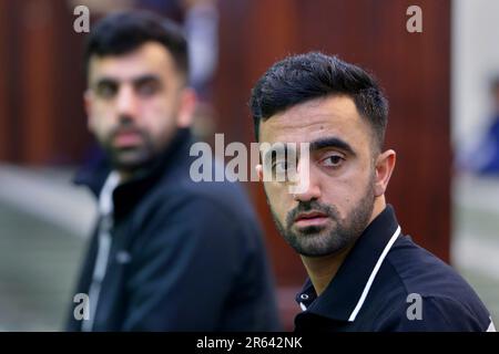 Brothers Samiullah Safi, left, and Abdul Wasi Safi, right, pray during ...
