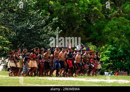 Tembe Indigenous people from neighboring villages arrive to take part ...