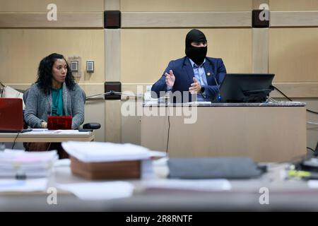 Broward Sheriff's Office Detective Danny Polo, whose face is concealed ...