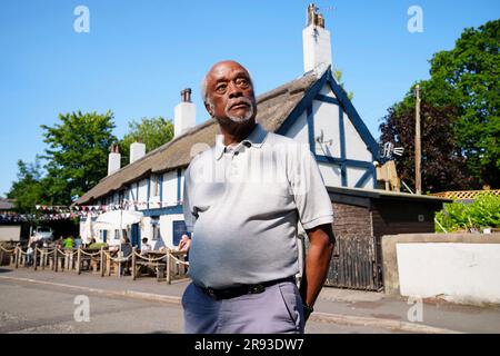 Clinton Smith, chair of Preston Black History Group reads a copy of a ...