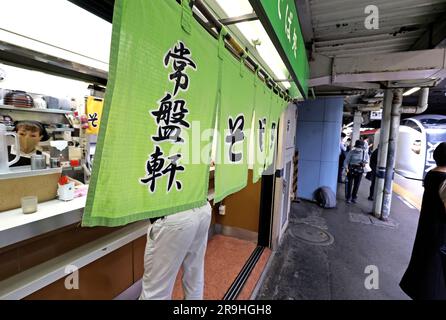 A photo shows a stand-up soba shop at a platform of train station in ...