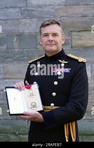 Lieutenant General Sir Nicholas Borton holds his medal after being made ...