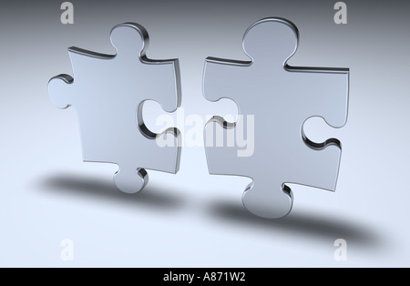 Puzzle-Stück passend in puzzle Stockfotografie - Alamy