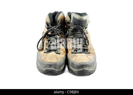 Paar alte, matschigen Wanderschuhe am Boden das Konzept der Abenteuer ...